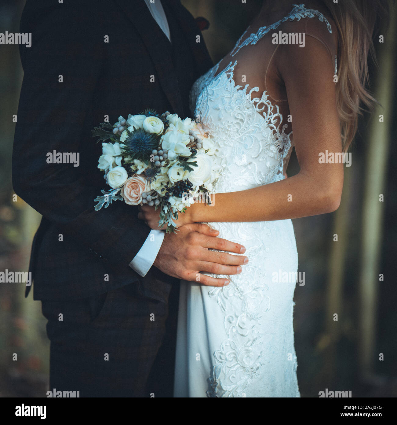 Loving Couple Hugging at their wedding Stock Photo - Alamy