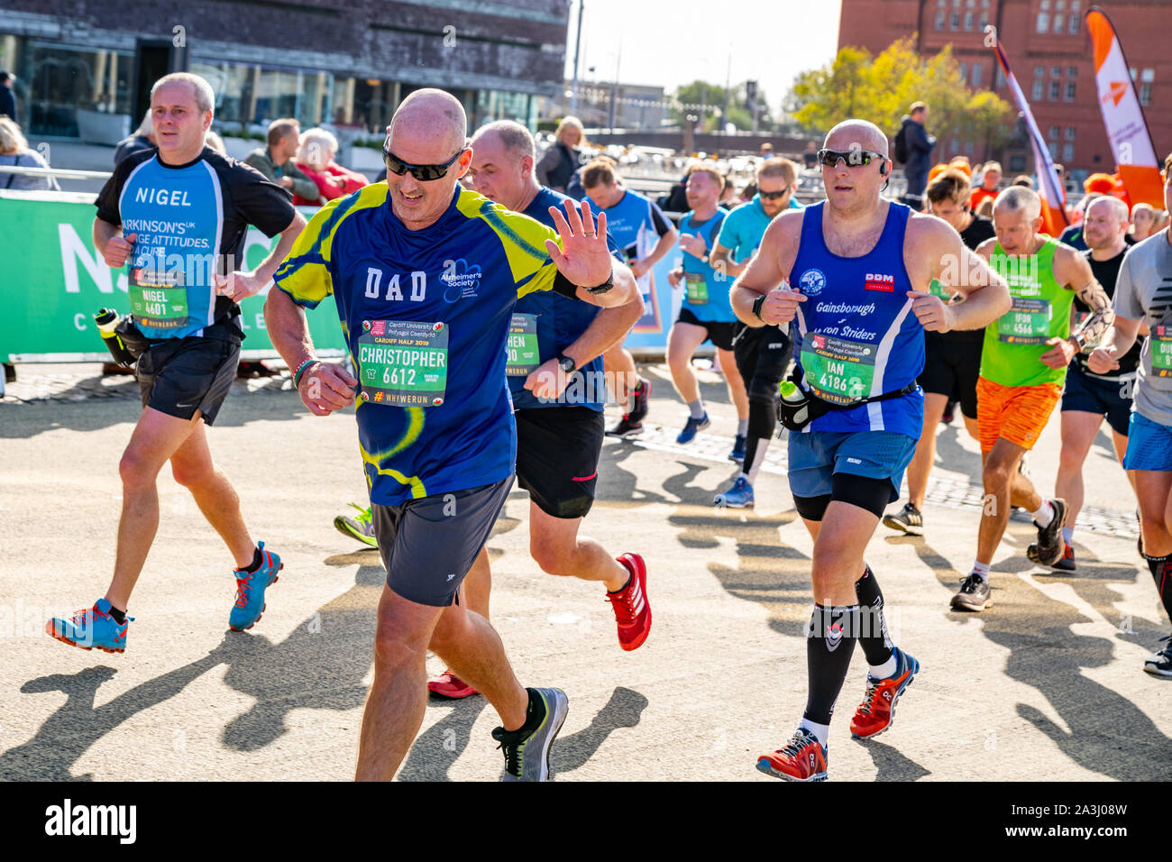 Cardiff Half Marathon: Runners and crowds raise money for charity ...