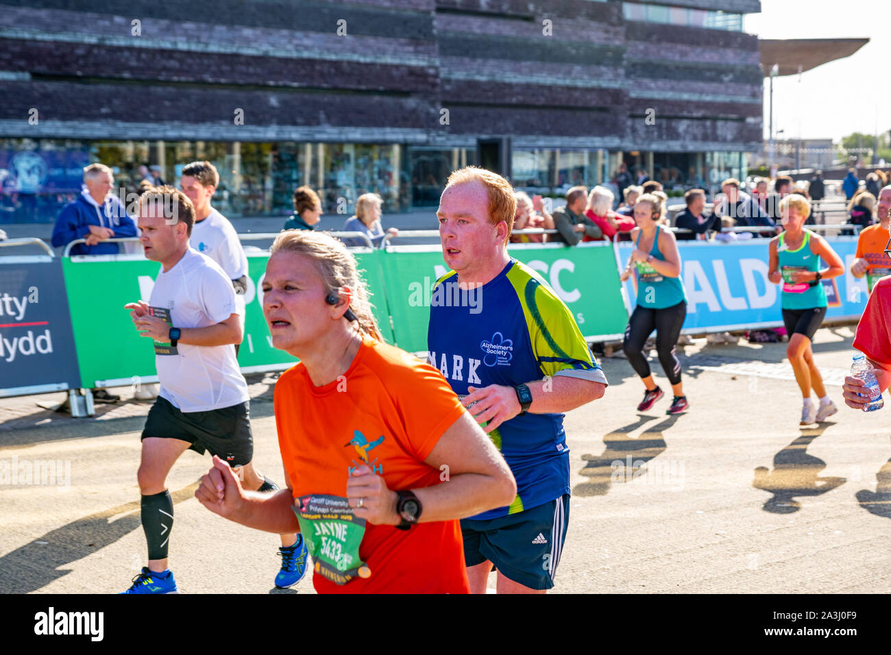 Cardiff Half Marathon: Runners and crowds raise money for charity ...