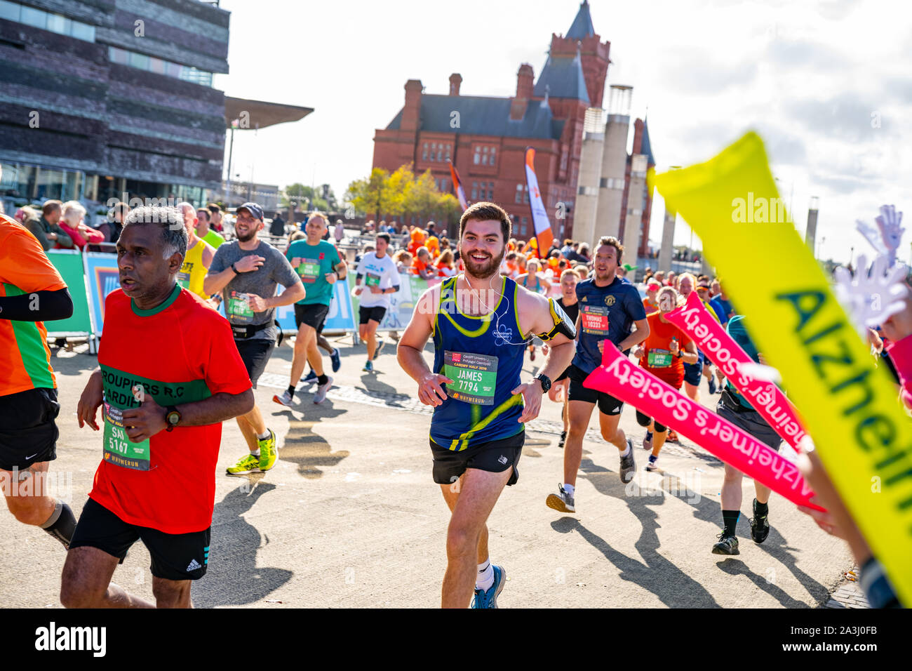 Cardiff Half Marathon: Runners and crowds raise money for charity ...