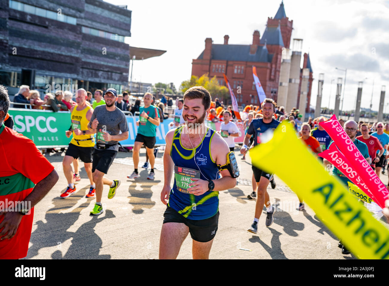 Cardiff Half Marathon: Runners and crowds raise money for charity ...