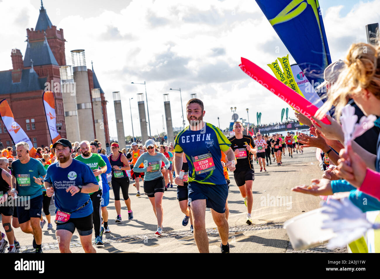 Cardiff Half Marathon: Runners and crowds raise money for charity ...