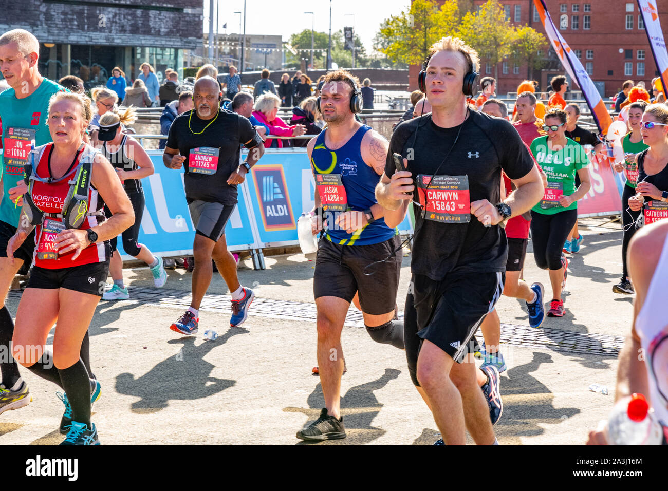 Cardiff Half Marathon: Runners and crowds raise money for charity ...