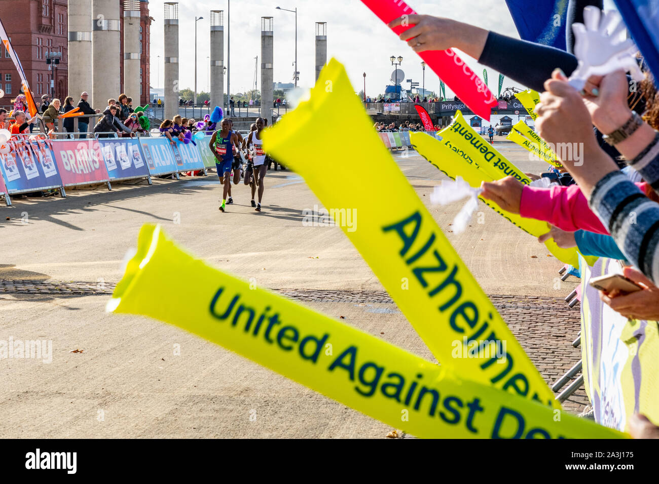 Cardiff Half Marathon: Runners and crowds raise money for charity ...