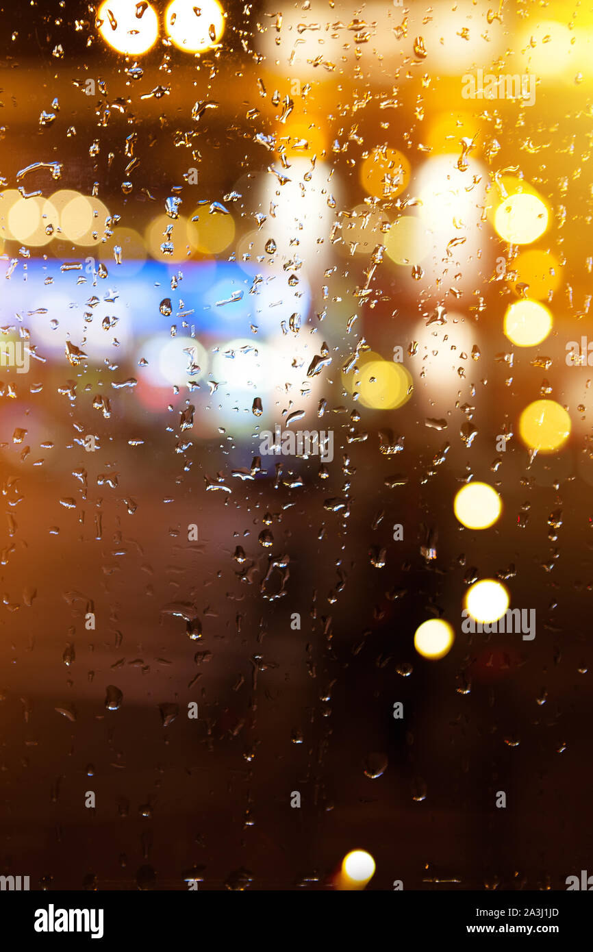 night city autumn rain background; window glass reflection Stock Photo ...