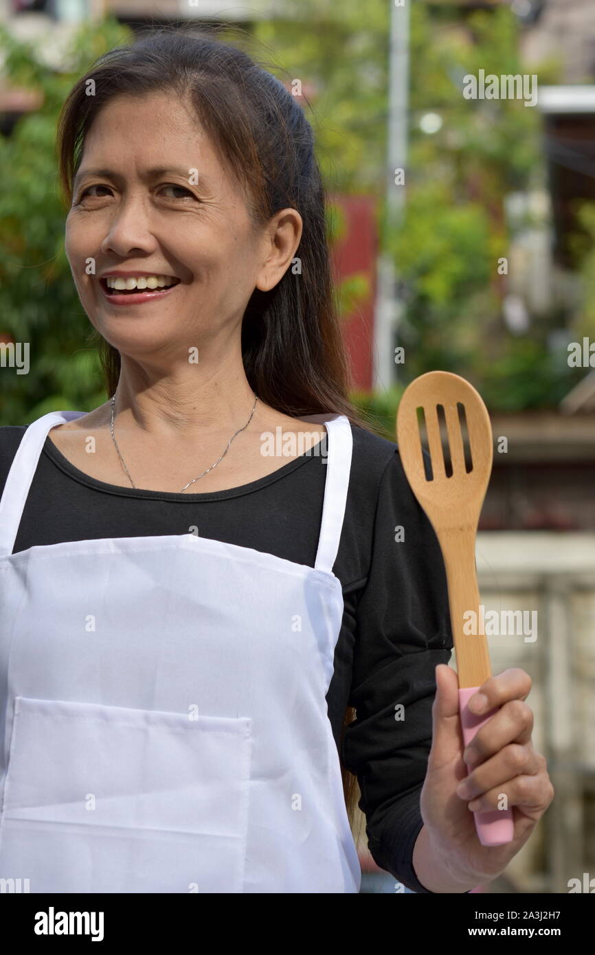 Lady cook hi-res stock photography and images - Alamy