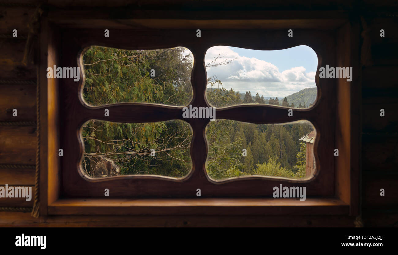 View of mountains from wooden traditional decorated hut window Stock ...