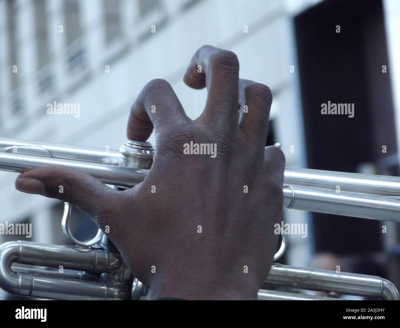 Playing trumpet hand hi-res stock photography and images - Alamy