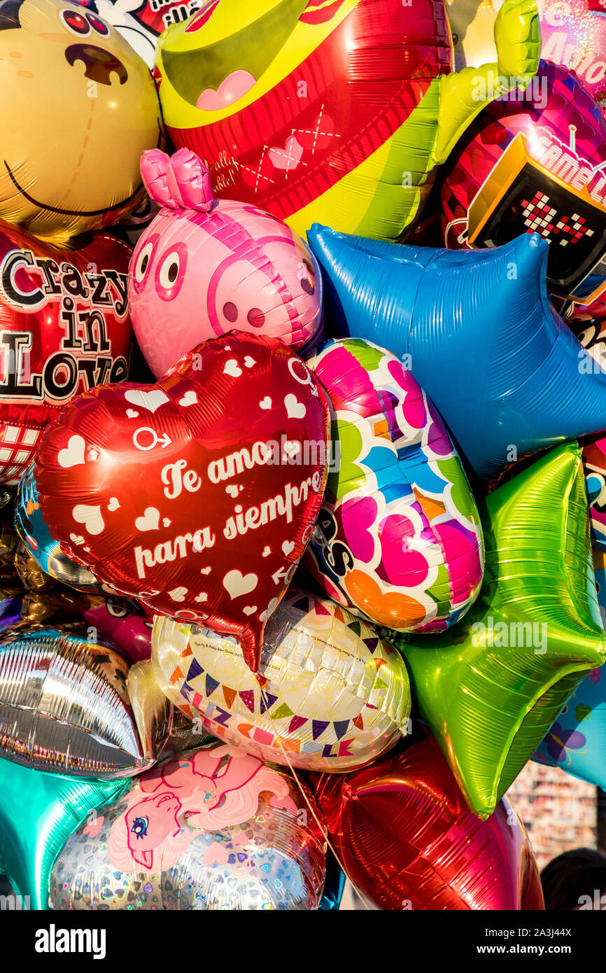 A Mexican vendor sells brightly colored balloons in the Loreto town ...