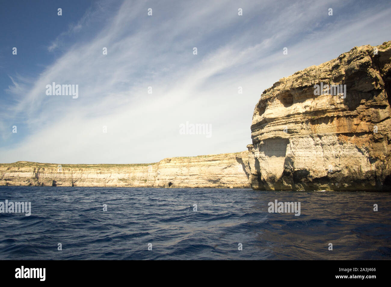 Boat trip next to Dwejra Cliffs in San Lawrenz, Gozo, Malta Stock Photo ...