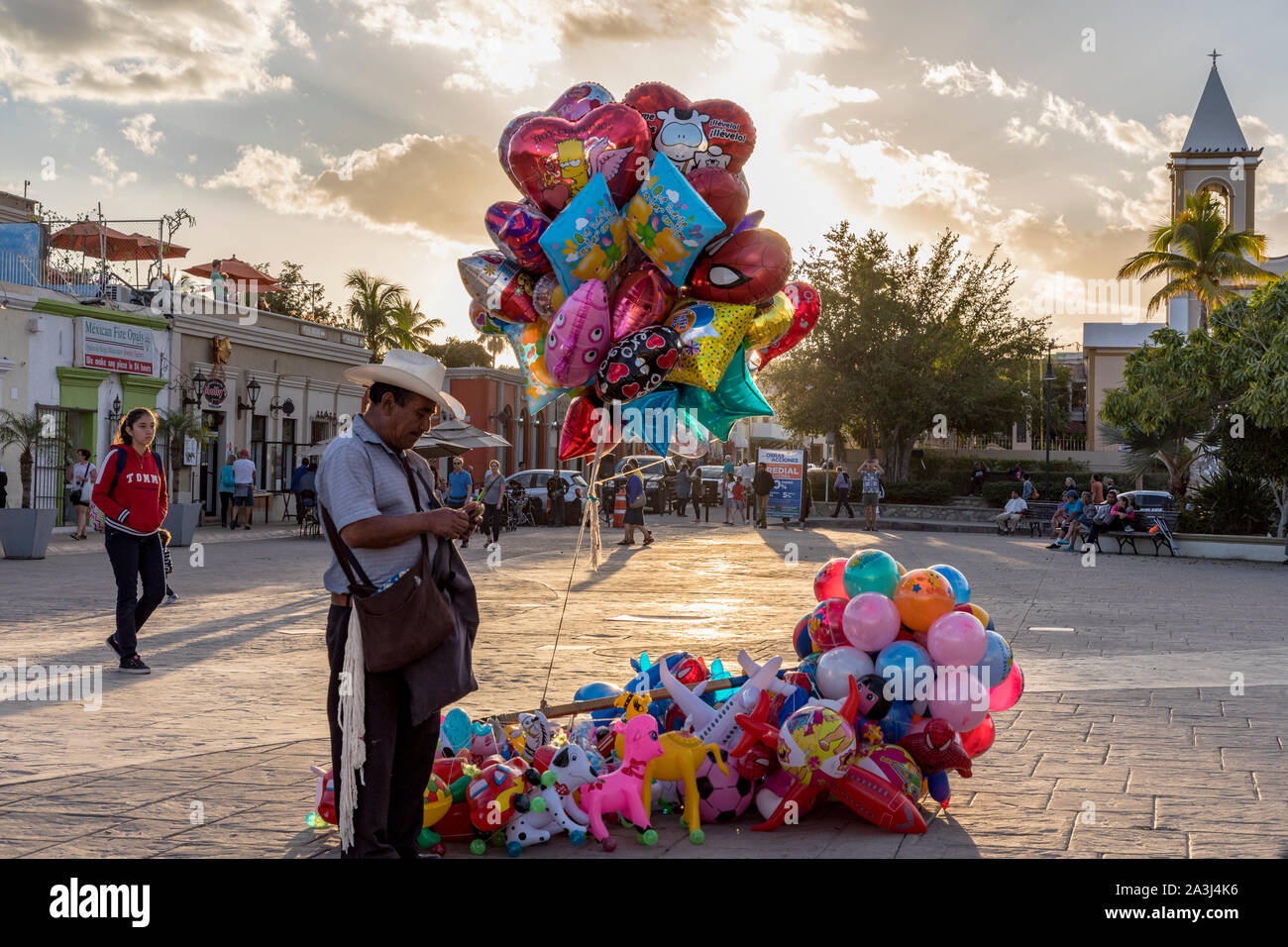 A Mexican vendor sells brightly colored balloons in the Loreto town ...