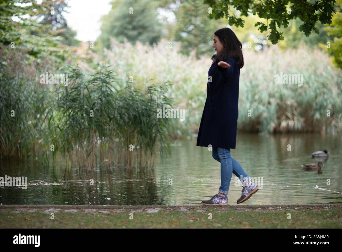 Woman with long hair in the pond hi-res stock photography and images ...