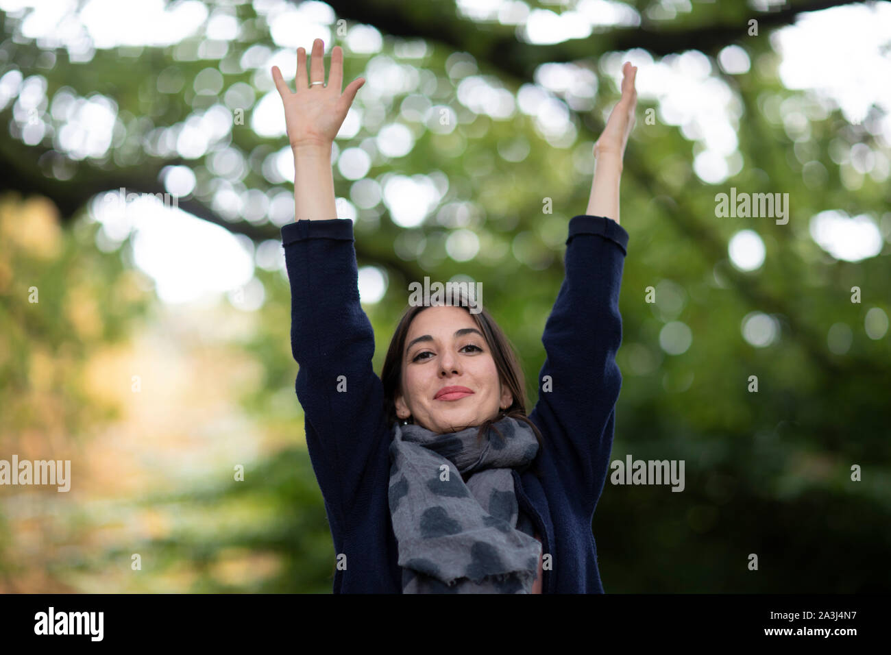 Spreading arms hi-res stock photography and images - Alamy
