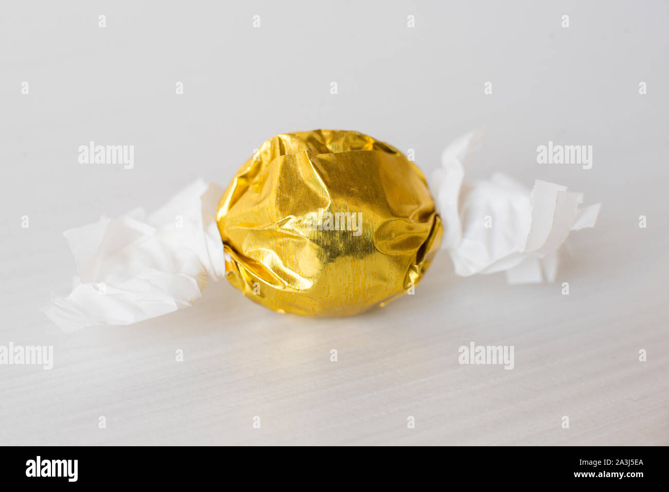 Little Chocolate Sweet covered in sugar and wrapped in colored papaer ...