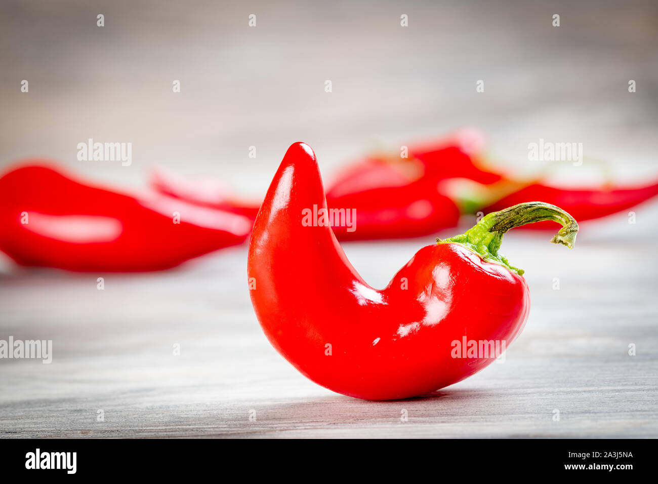 Red Mexican pepper with a curve to is Stock Photo - Alamy
