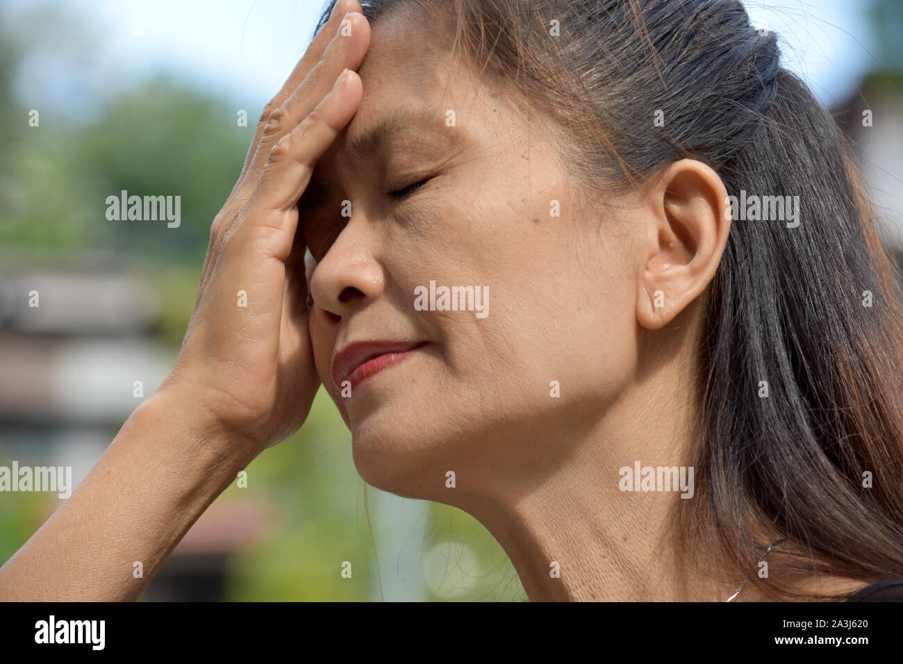 A Sad Female Senior Grandmother Stock Photo - Alamy