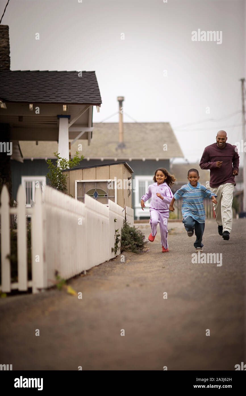 Children suburban street playing hi-res stock photography and images ...