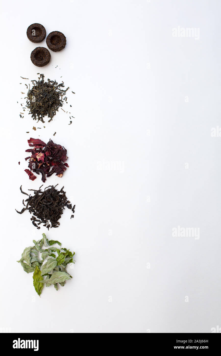 Different kinds of herbal tea isolated on white background. Vertical ...