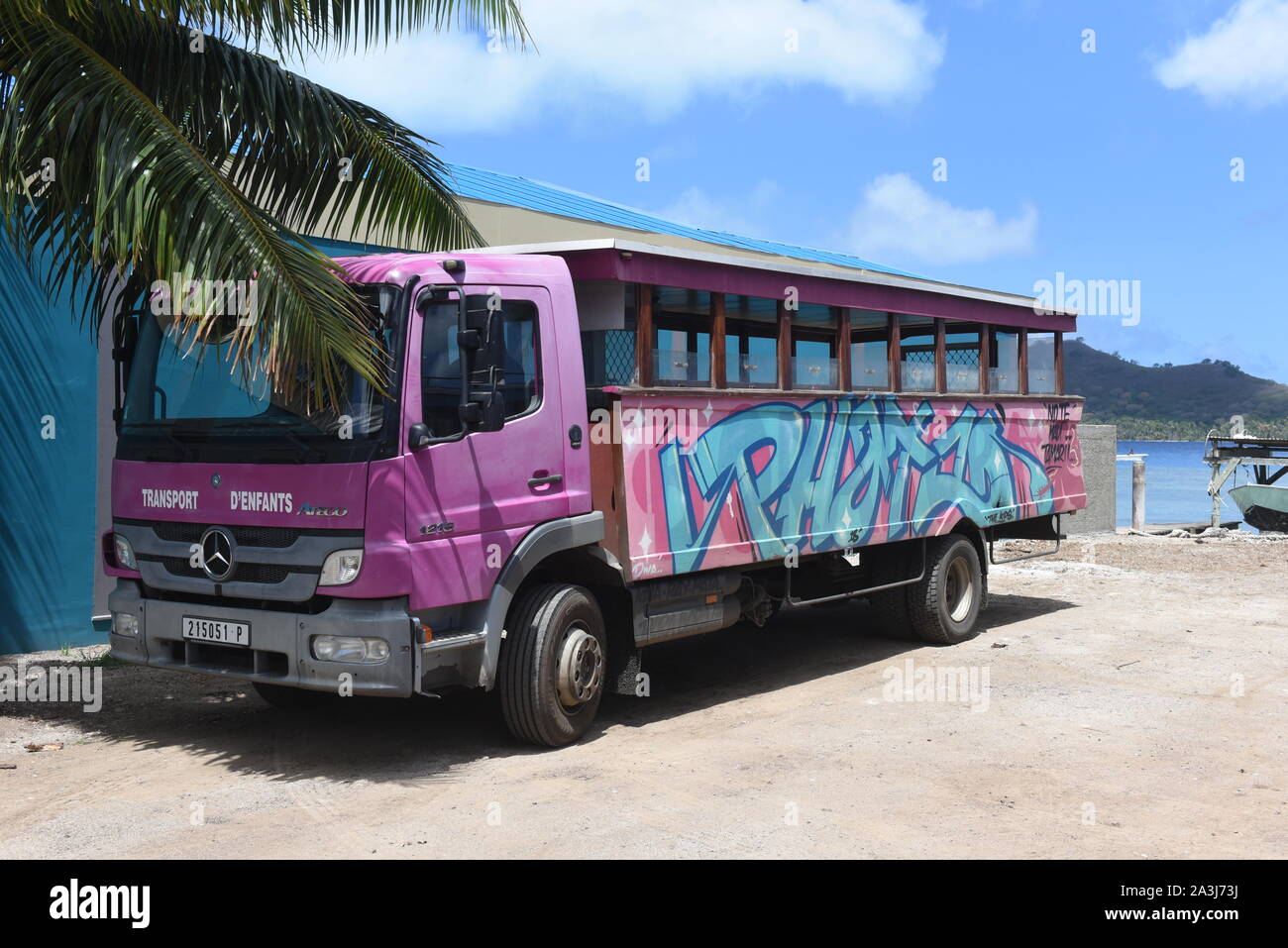 A school bus in the small village of Vaitape.Bora Bora is a volcanic ...