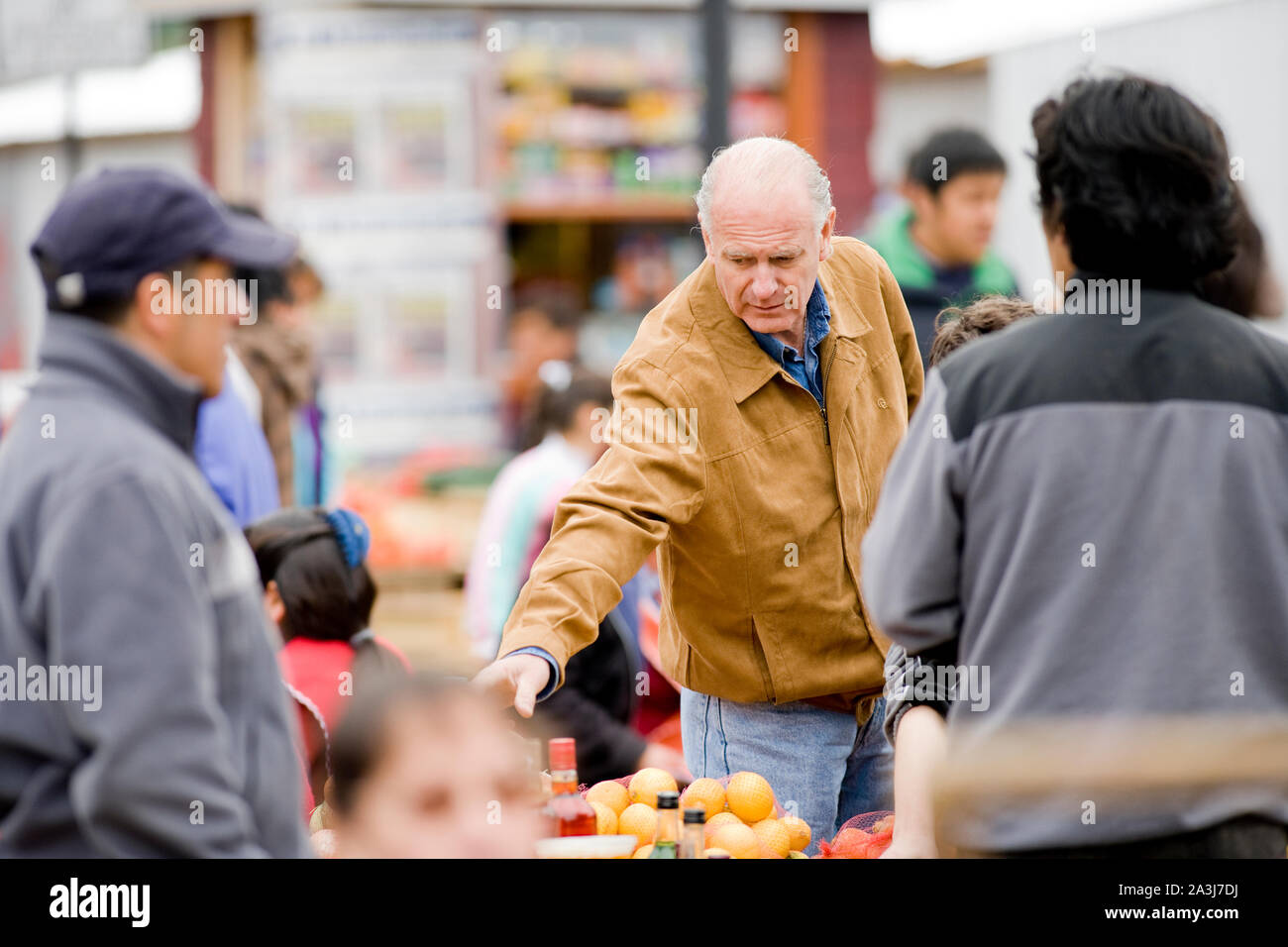 People shopping at a market Stock Photo - Alamy