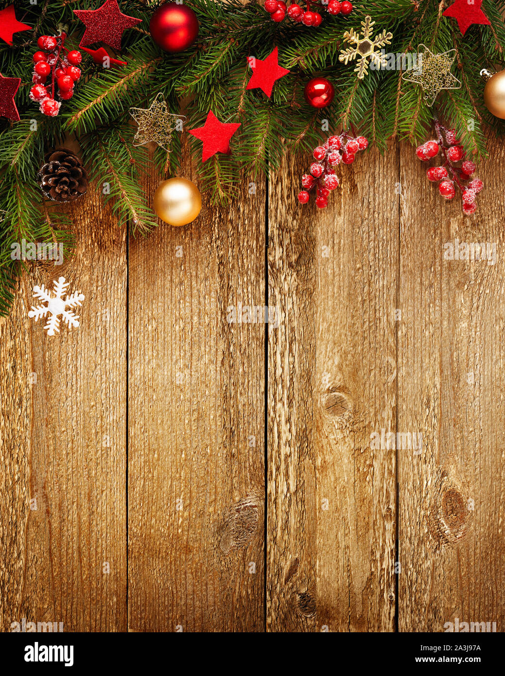 Christmas wooden background with decoration and fir tree. View with ...