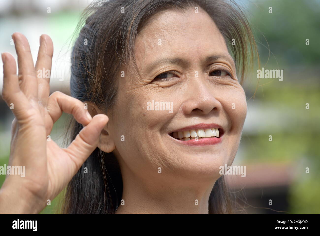 An Okay Asian Female Senior Grandma Stock Photo - Alamy