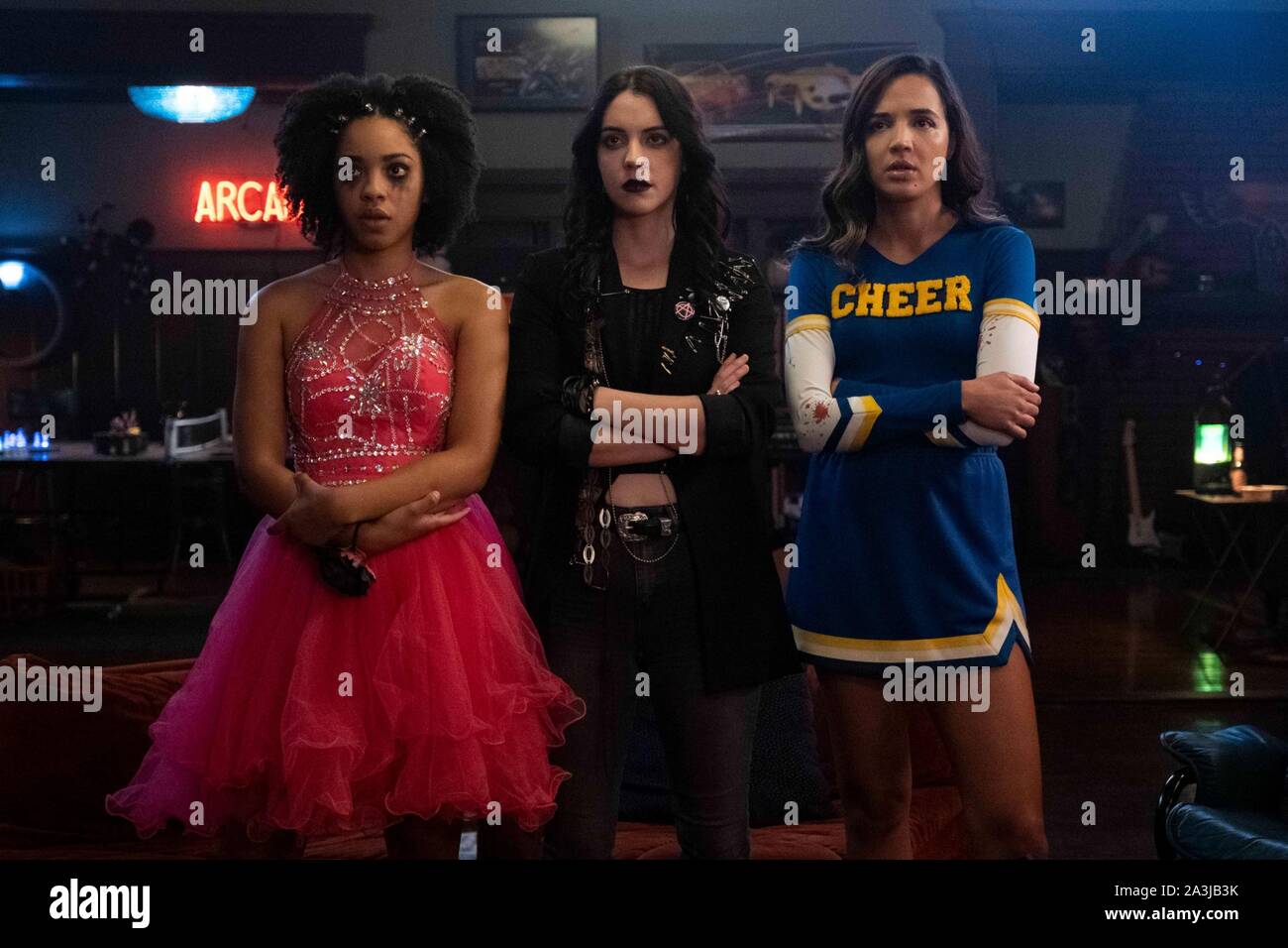 INTO THE DARK, from left: Paige McGhee, Adelaide Kane, Georgie Flores ...