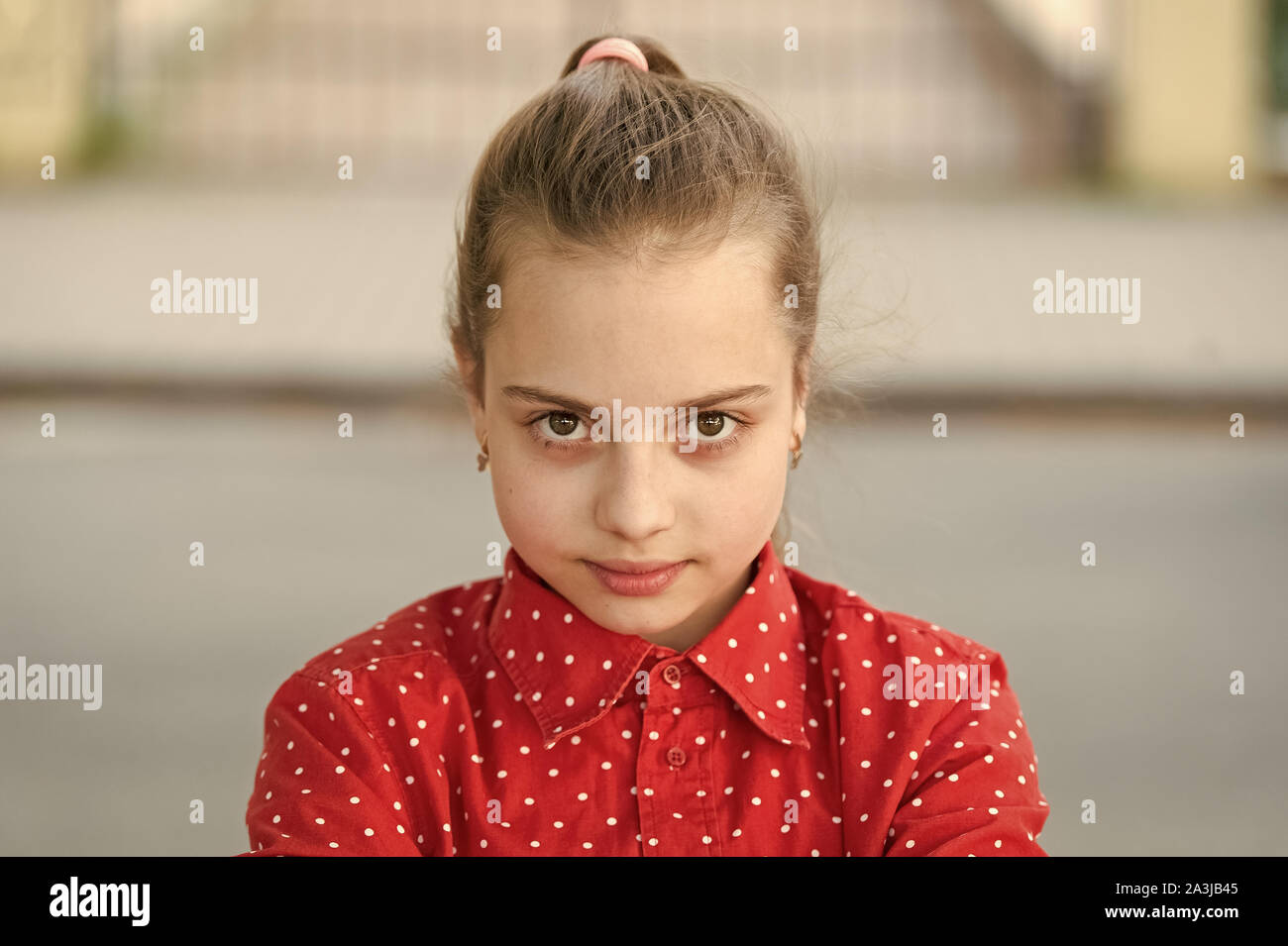 Pretty serious. Girl carefree child. International childrens day ...