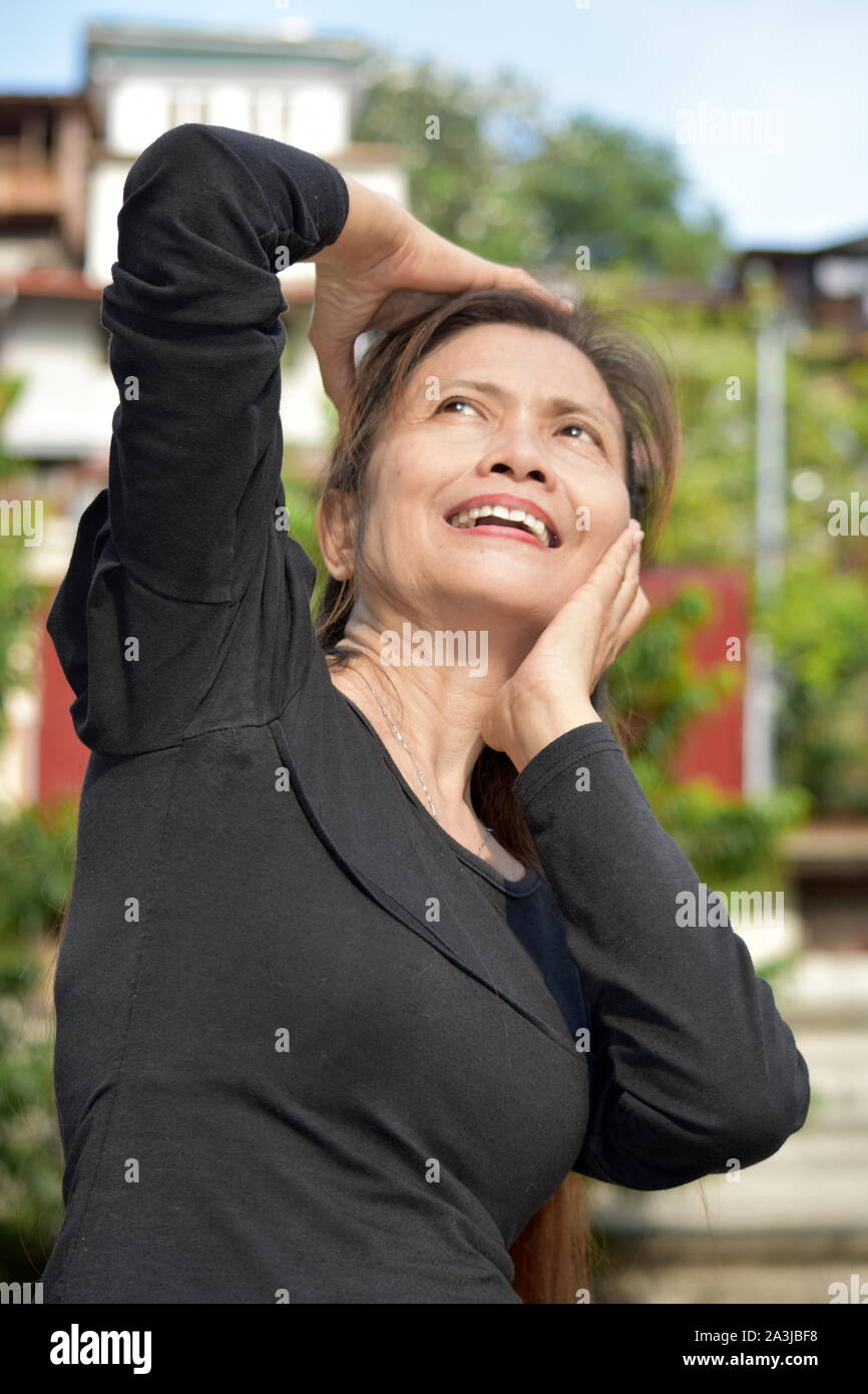 A Contemplative Female Senior Woman Stock Photo - Alamy