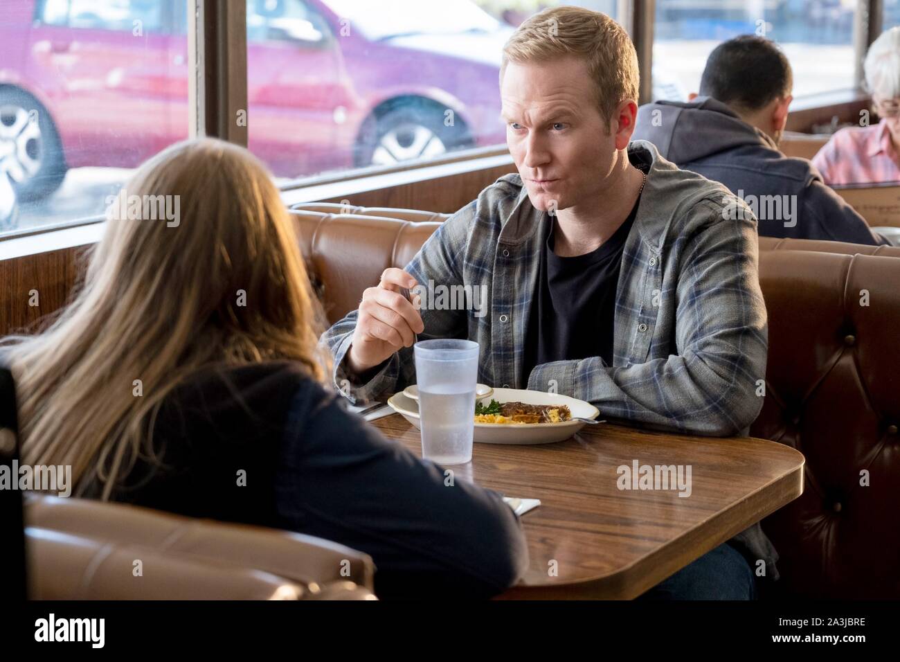 UNBELIEVABLE, from left: Merritt Wever (back to camera), Connor Tillman ...