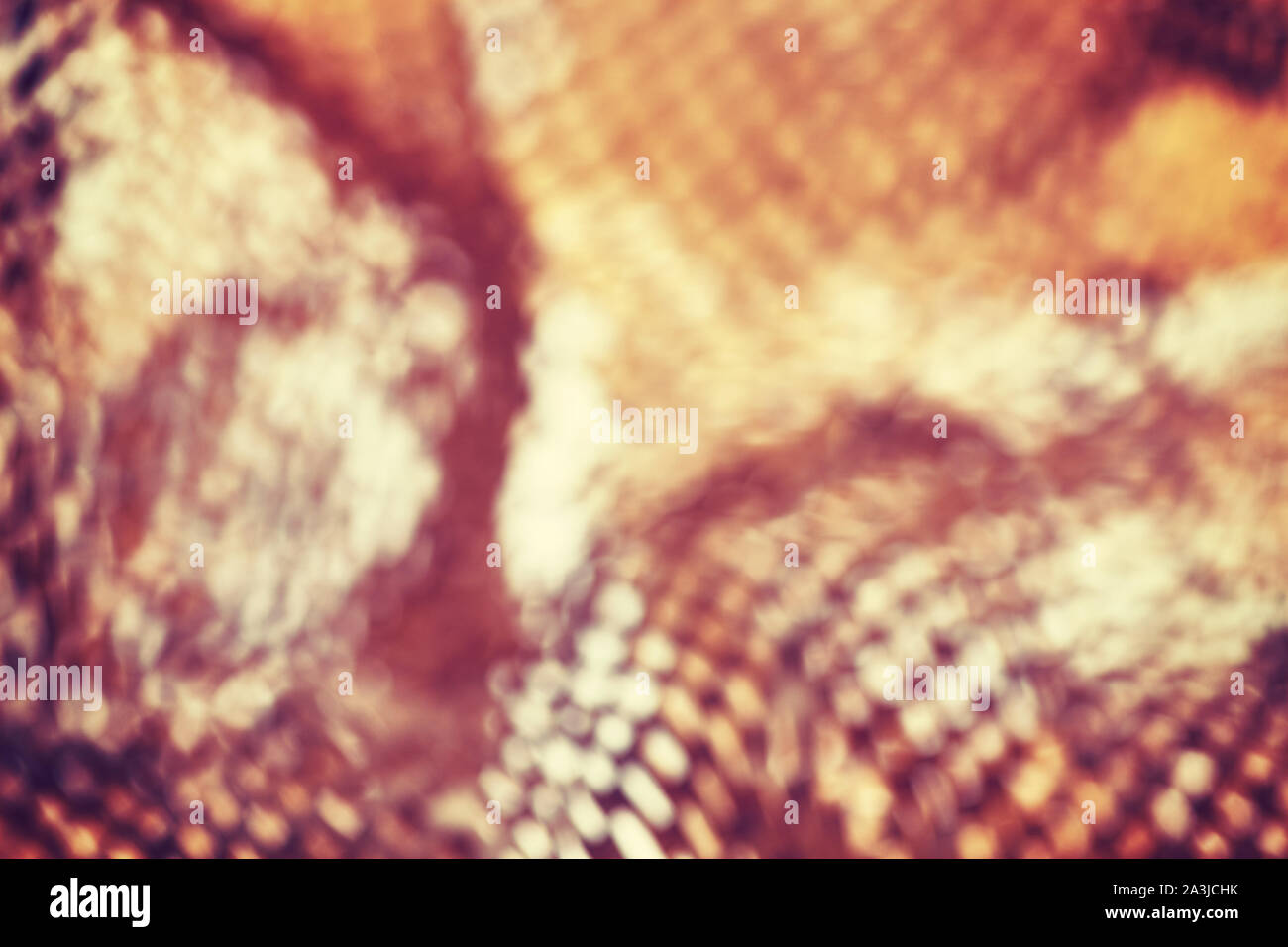Abstract blurred background, picture of defocused perforated brown ...