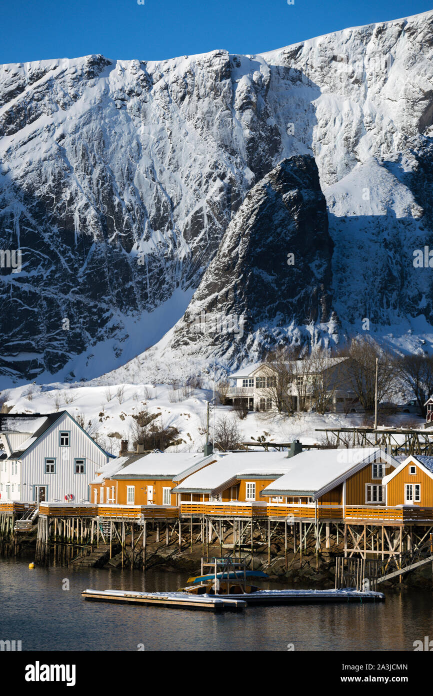 traditional norwegian wooden house rorbu to stand on the shore of the ...