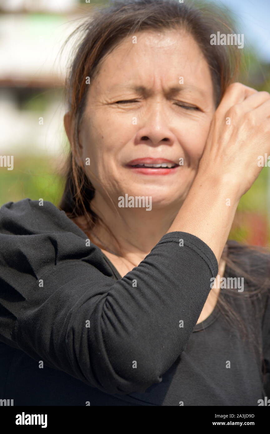 A Tearful Female Senior Stock Photo - Alamy
