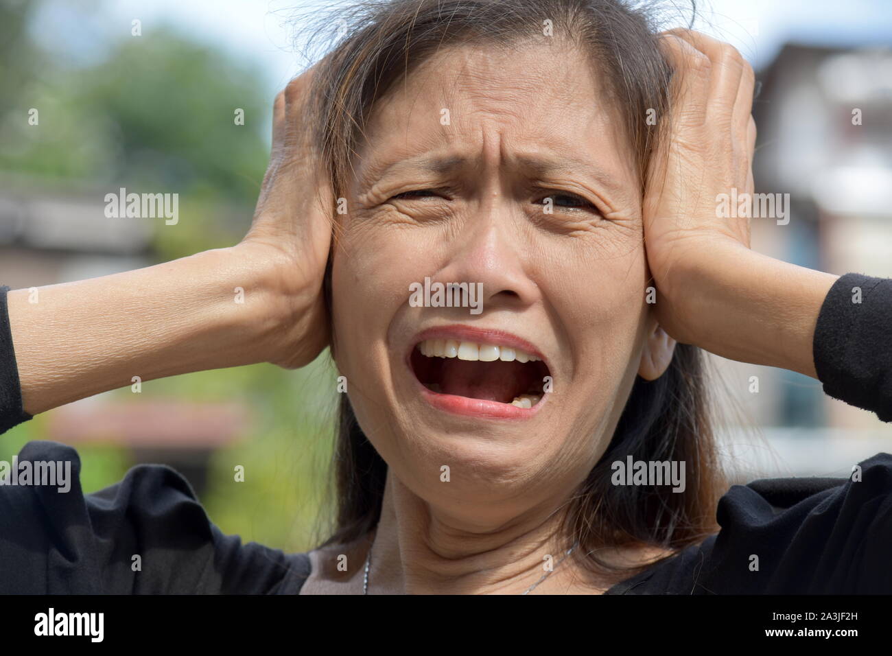 A Quiet Female Senior Grandmother Stock Photo - Alamy