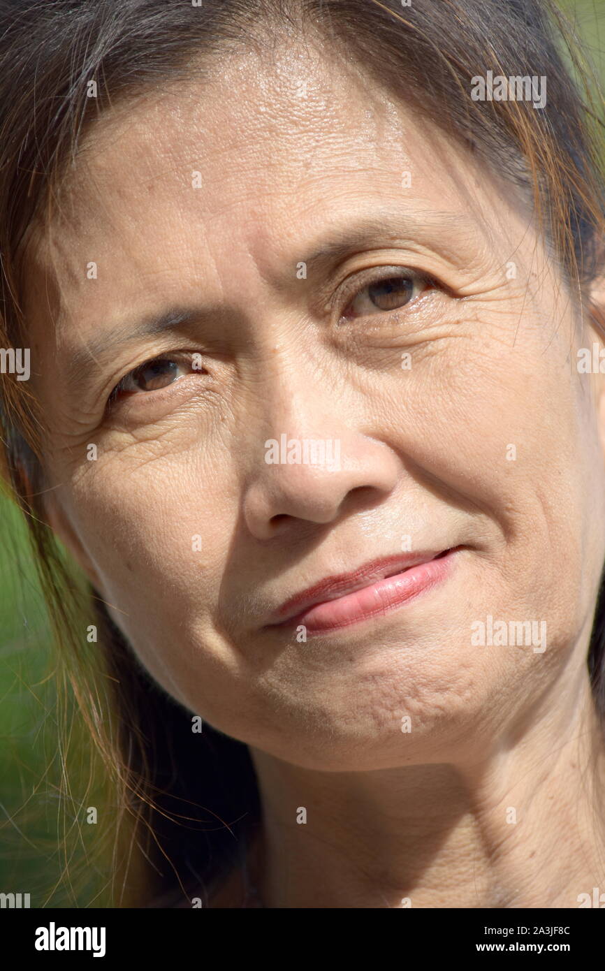 A Serious Old Female Senior Grandma Stock Photo - Alamy