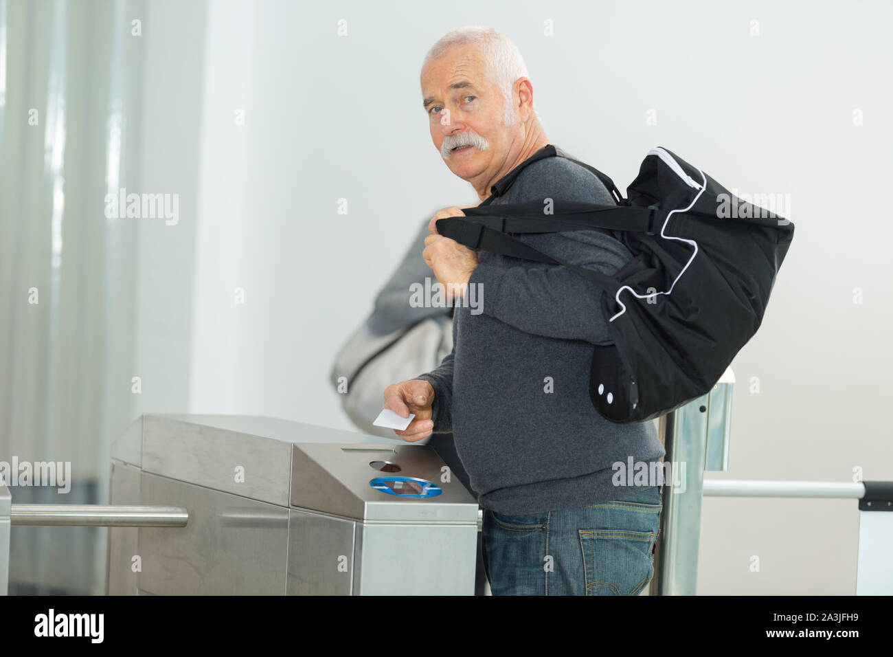 Man holding ticket hi-res stock photography and images - Alamy