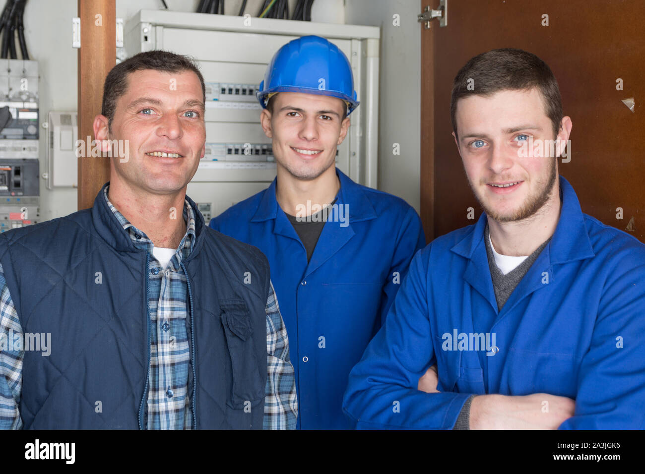 young apprentices with electrician professional Stock Photo - Alamy