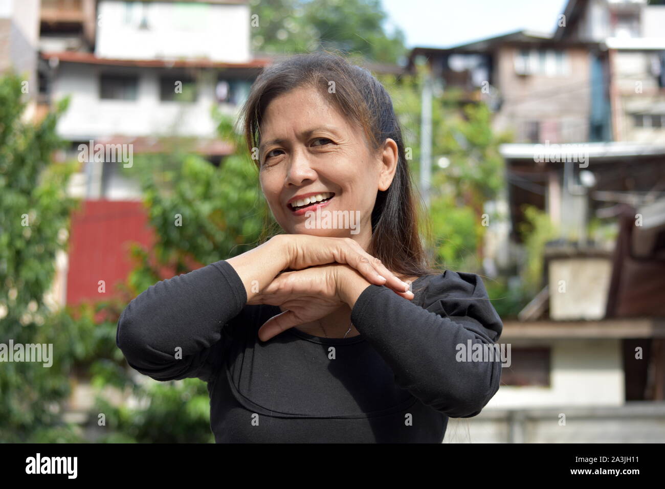 A Happy Adult Female Stock Photo - Alamy
