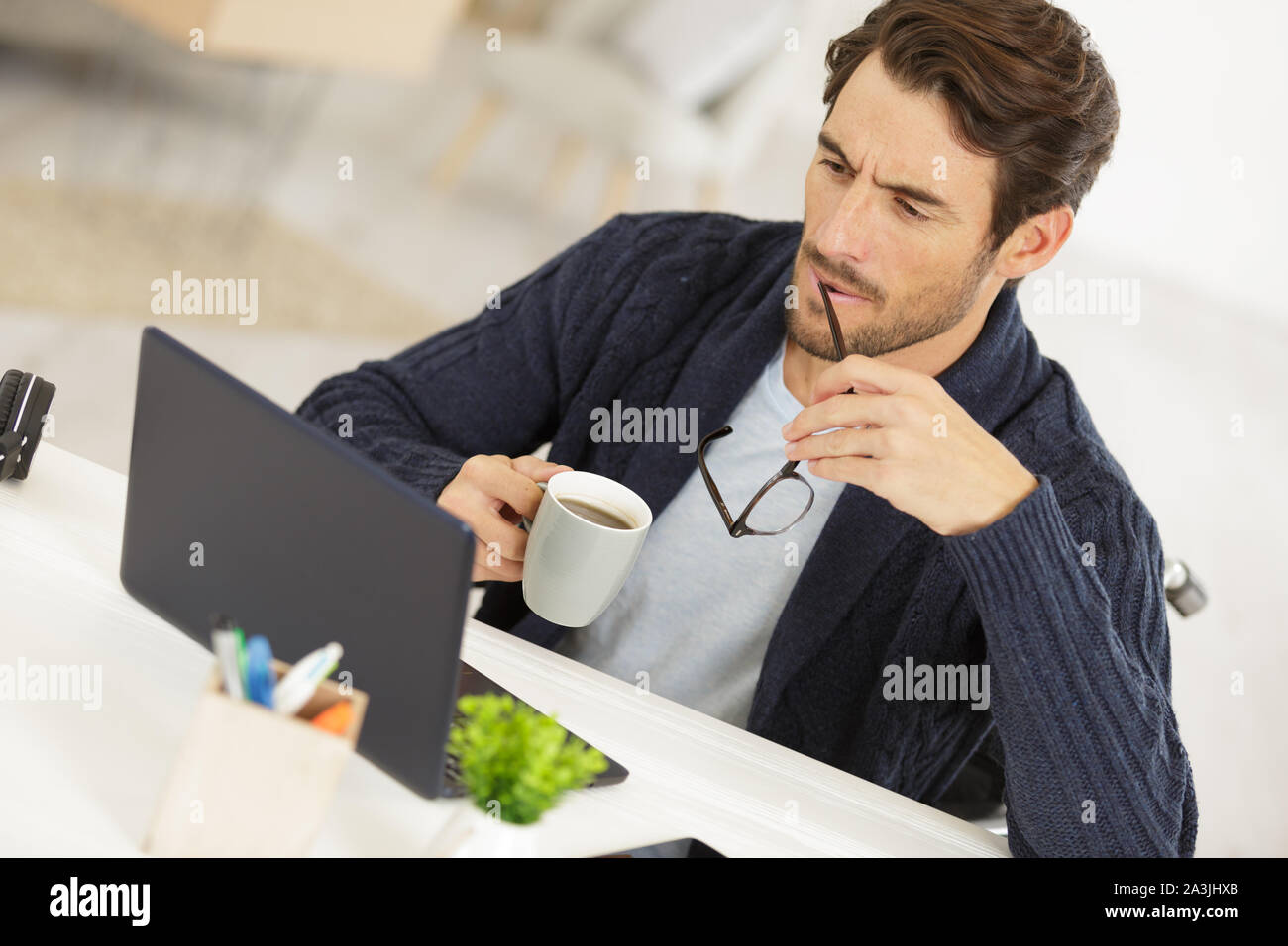Engrossed man hi-res stock photography and images - Alamy