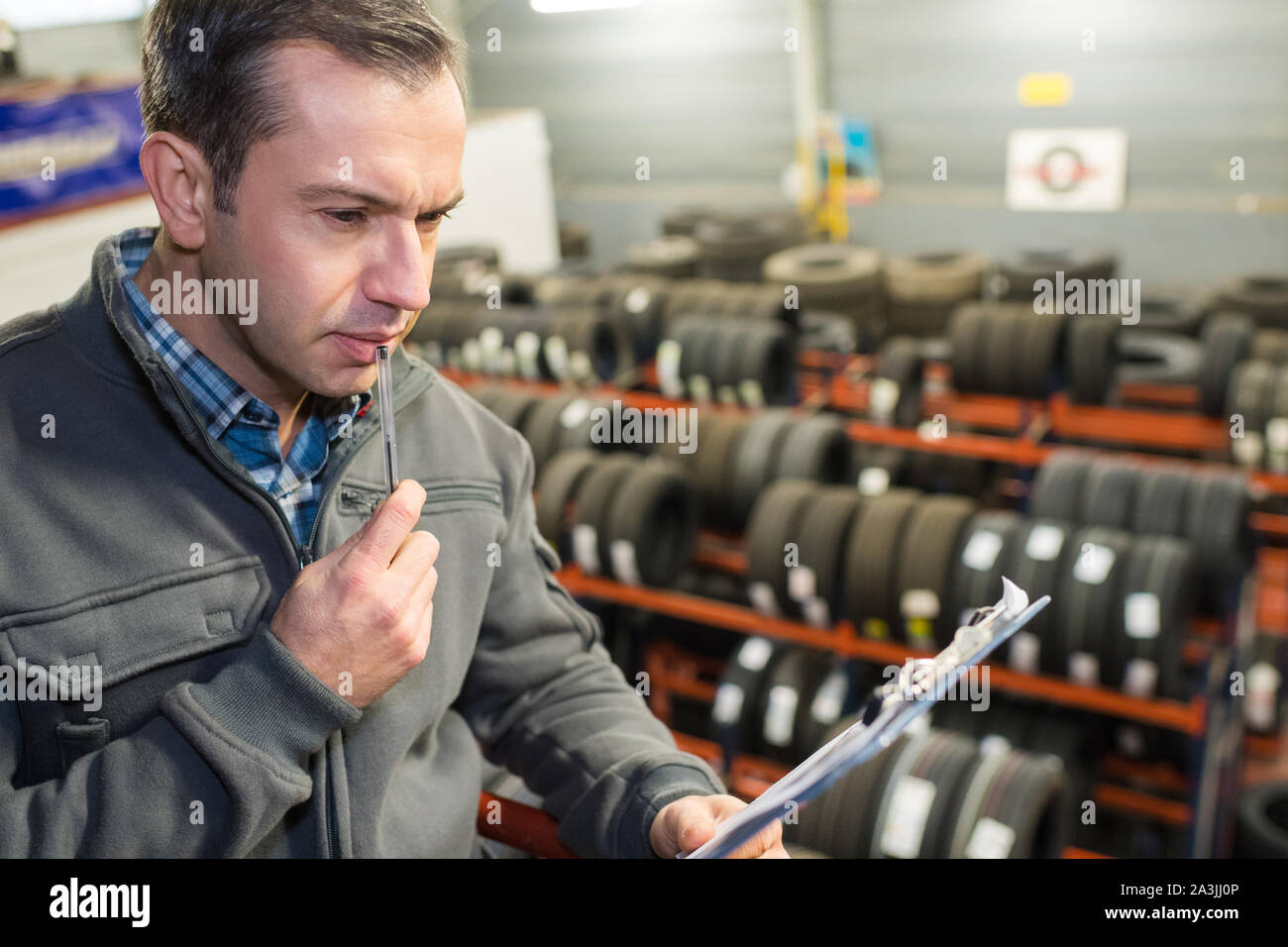 Checking tyres hi-res stock photography and images - Alamy
