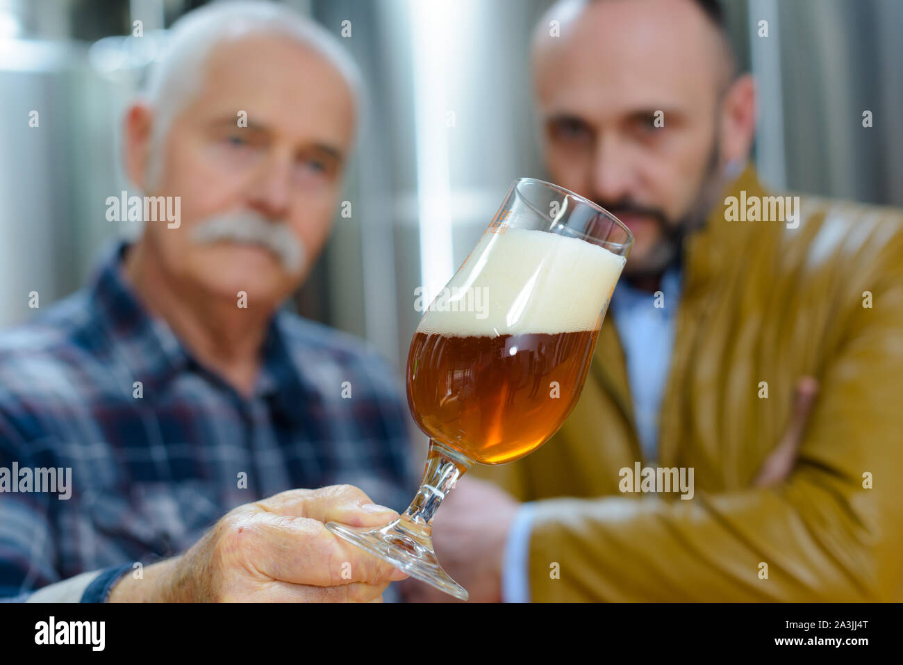 a distillery professional inspection product Stock Photo - Alamy