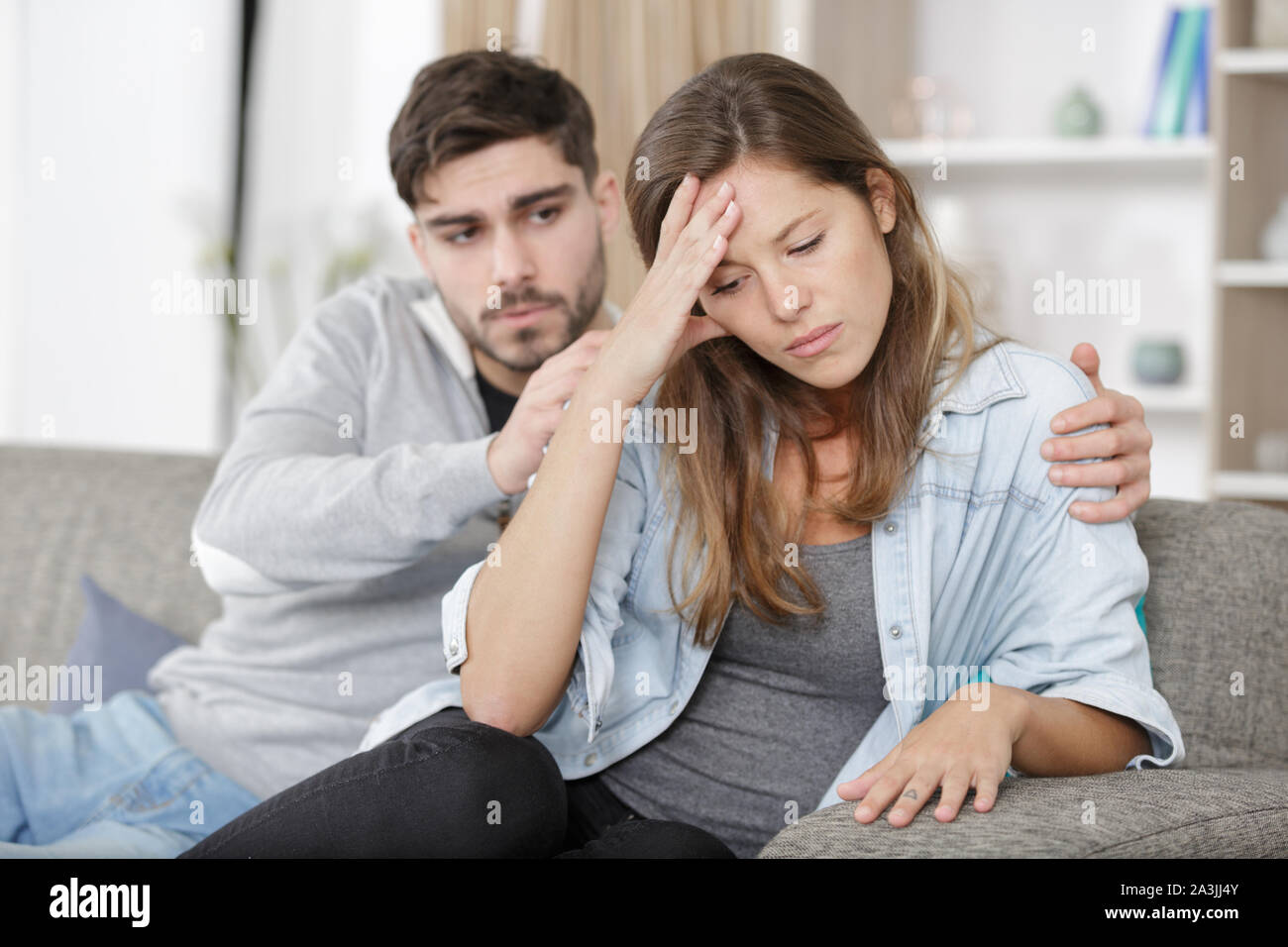 a man consoling upset woman Stock Photo - Alamy