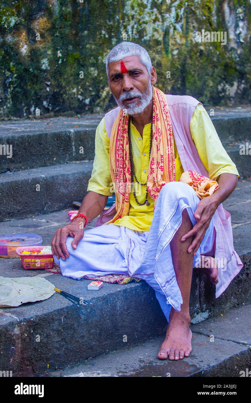 Indian man at Banganga Tank in Mumbai India Stock Photo - Alamy