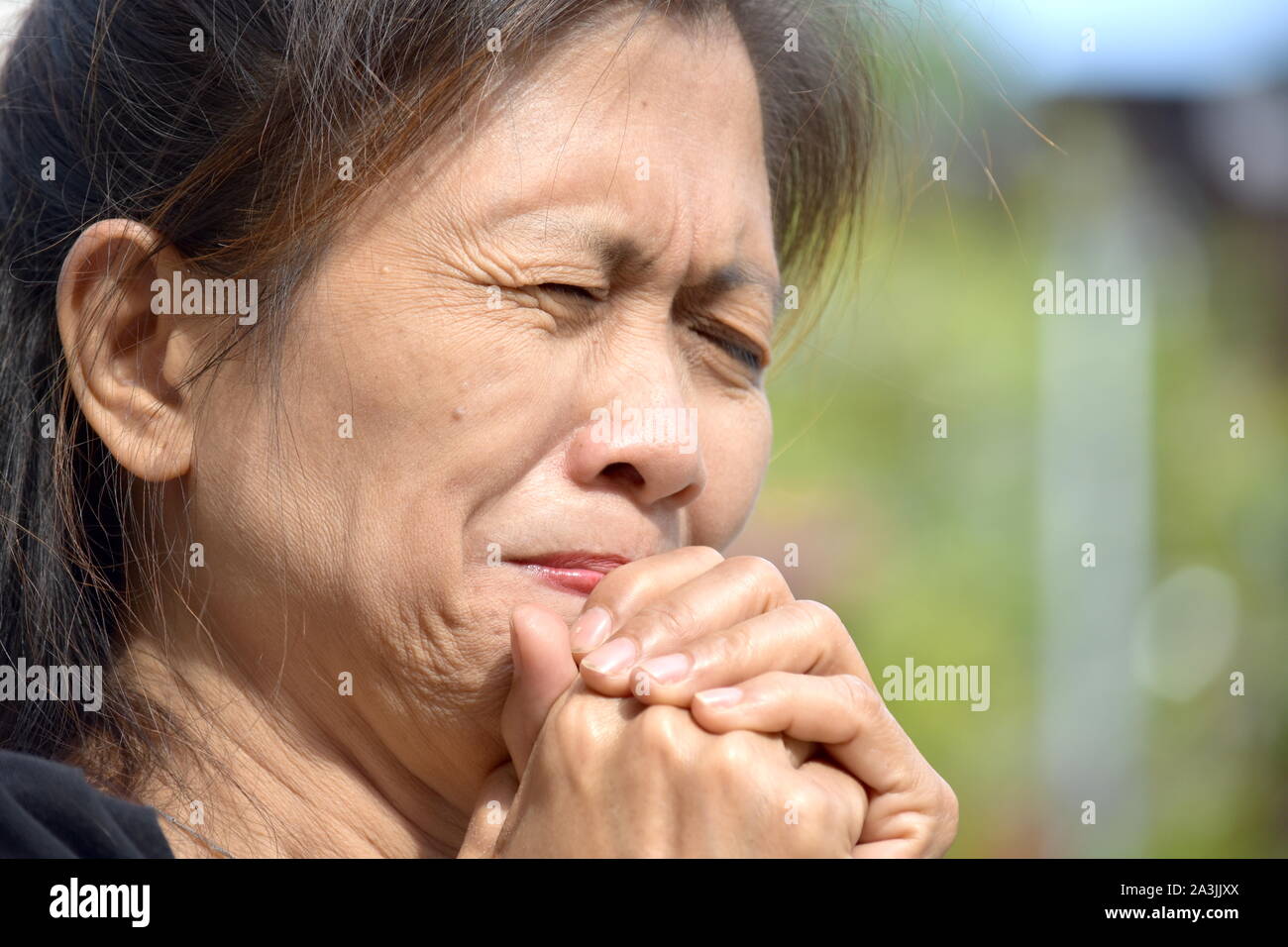 A Crying Asian Female Senior Grandmother Stock Photo - Alamy