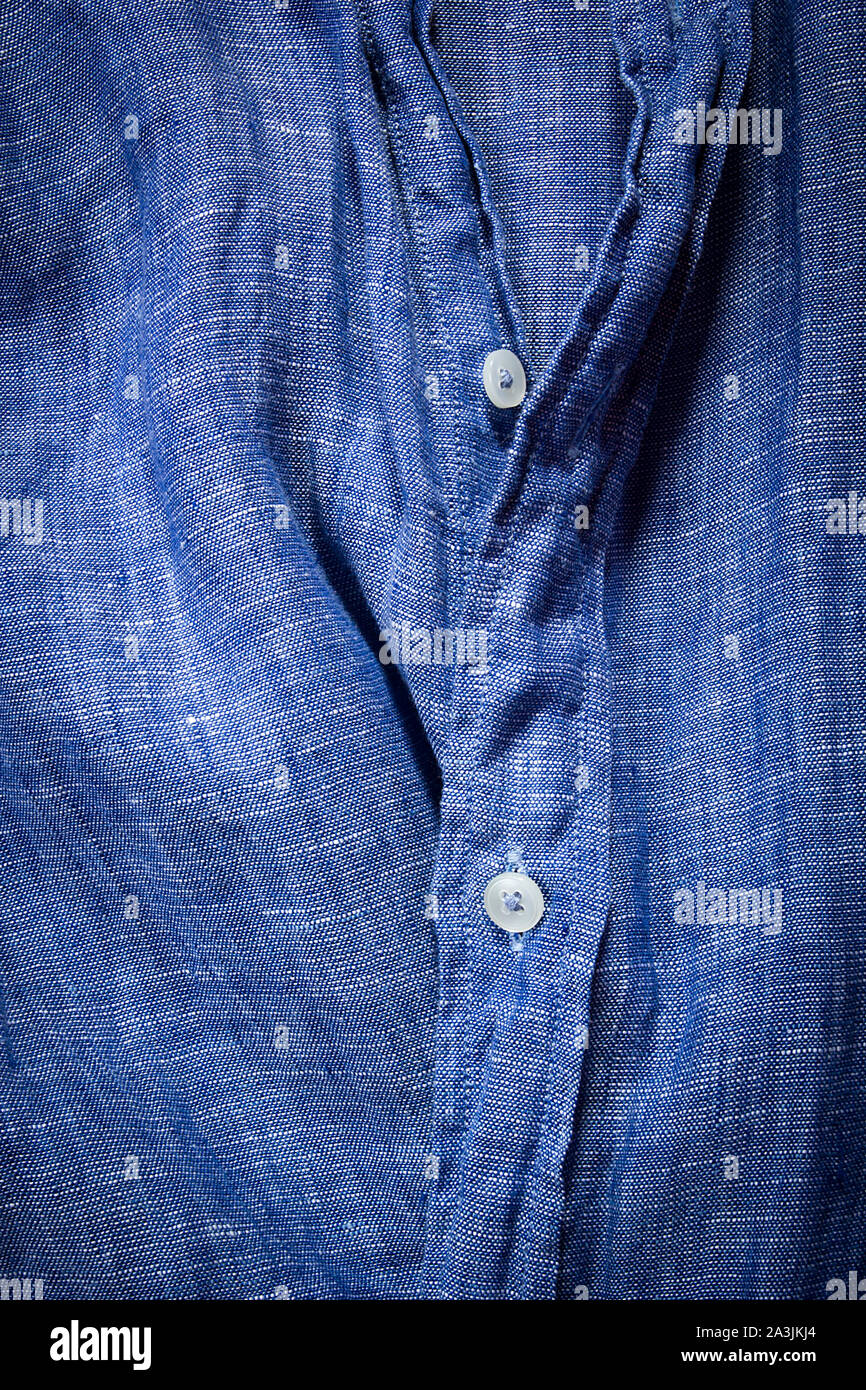 Crumpled blue shirt hi-res stock photography and images - Alamy