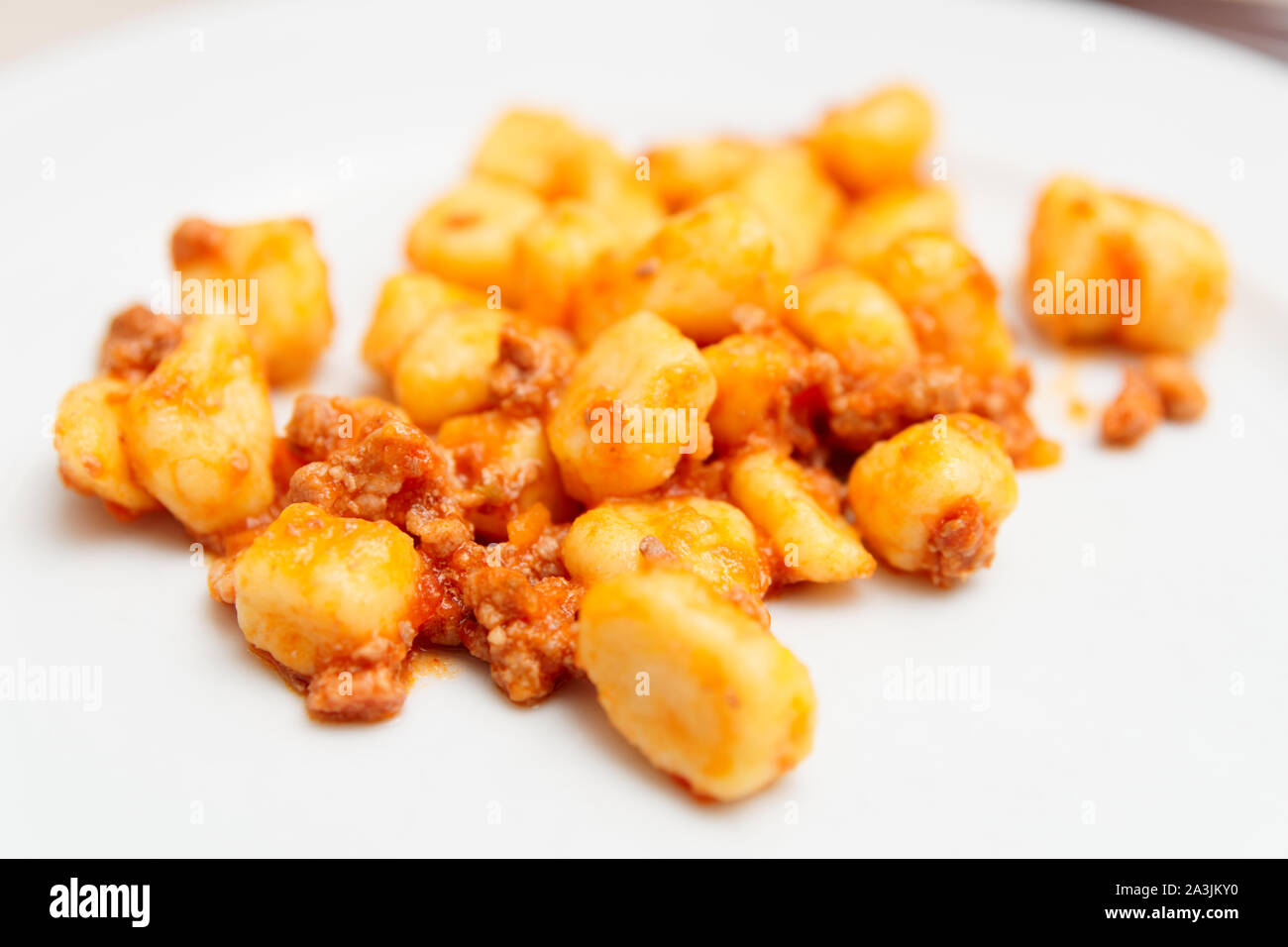 Italian gnocchi with meat ragout Stock Photo - Alamy