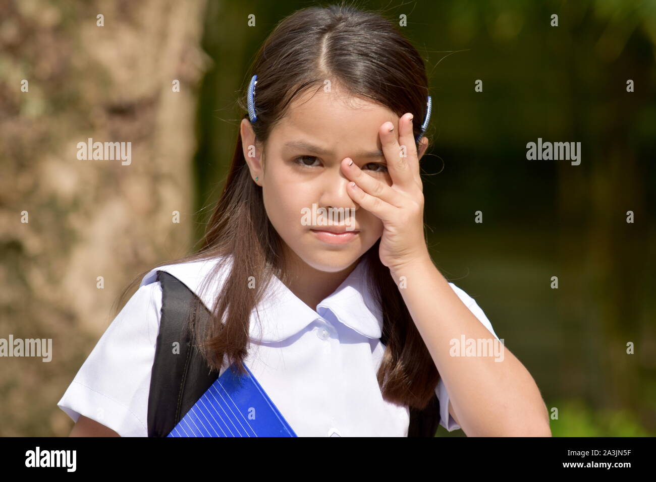 Shy Minority Child Girl Student Wearing School Uniform Stock Photo - Alamy