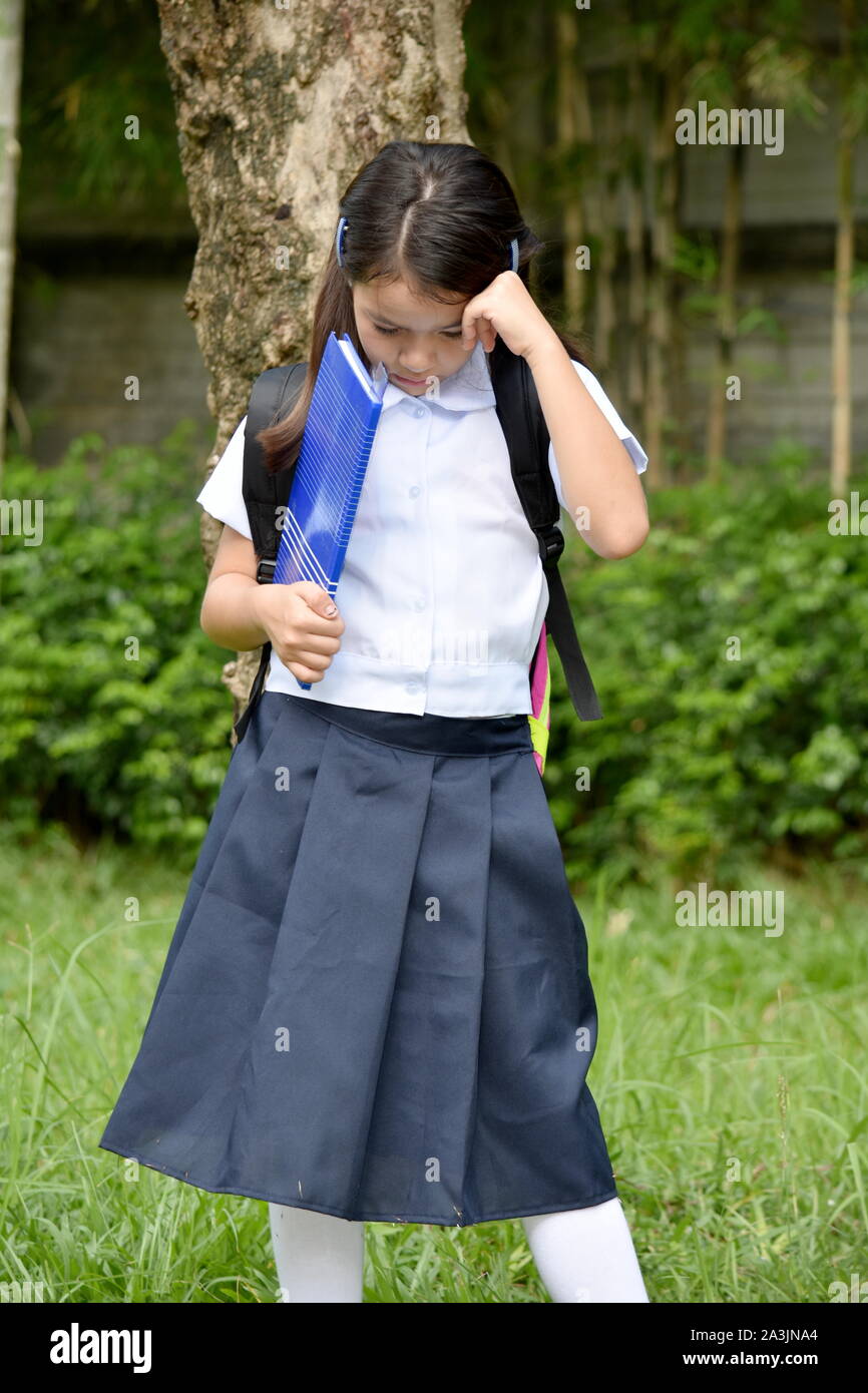 Sad girl school uniform hi-res stock photography and images - Alamy