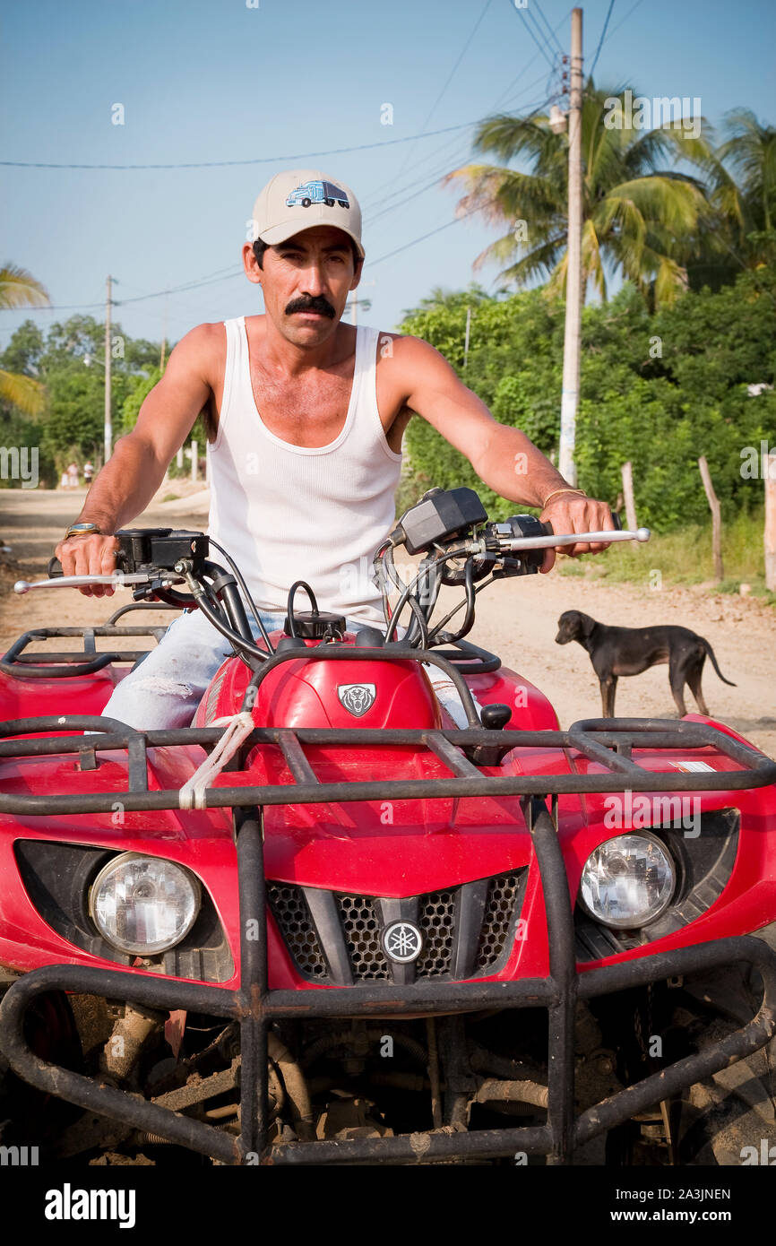 Portrait of male farmer working the field, with a strong look, work da ...