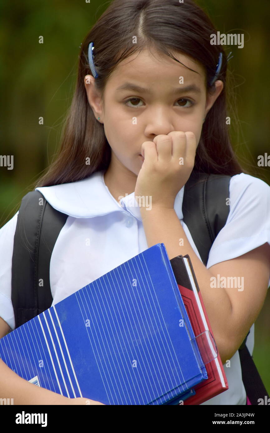 Minority Female Student And Fear Wearing School Uniform Stock Photo - Alamy